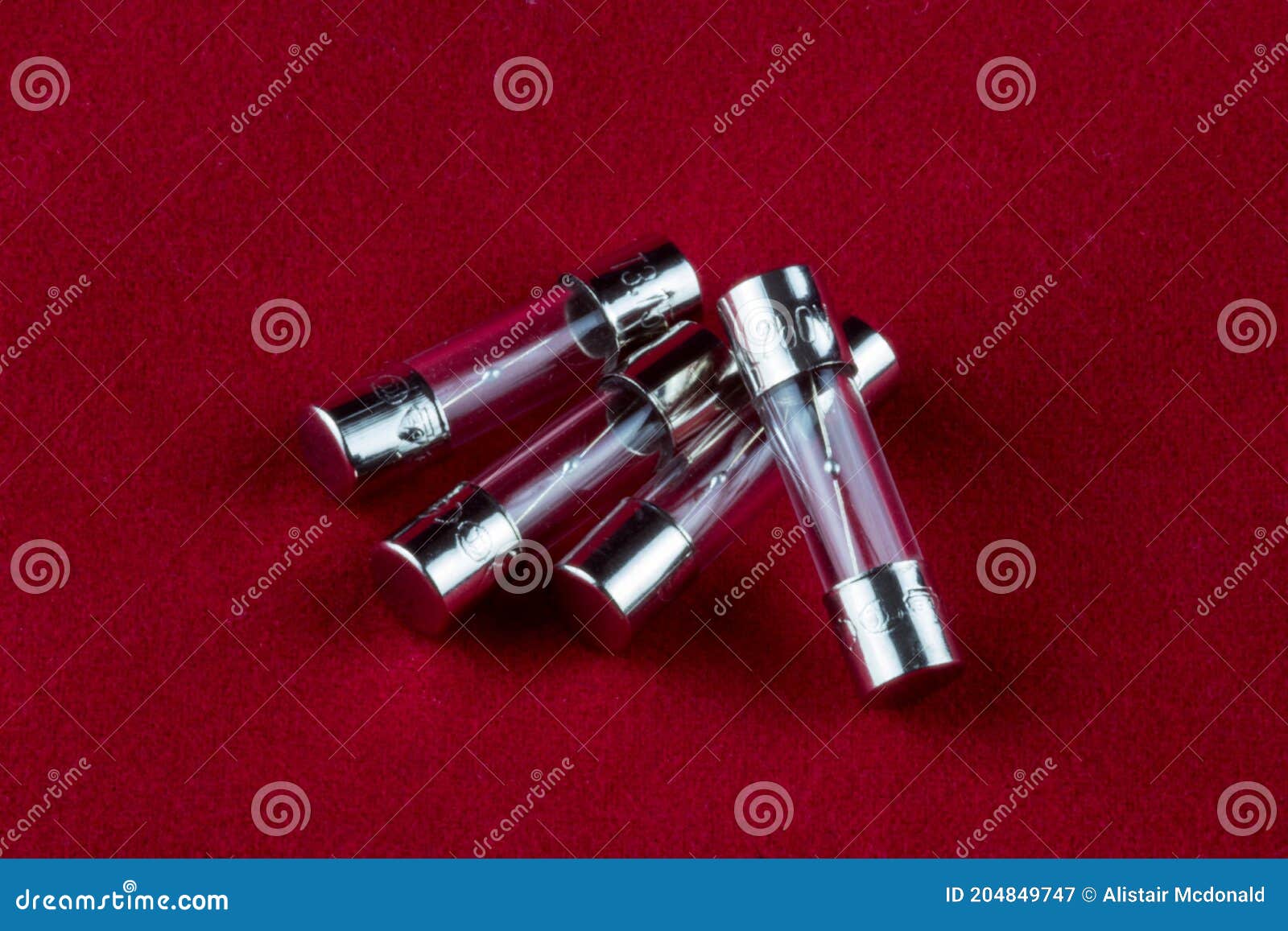 Small Electrical Fuses on a Red Background Stock Image - Image of ...