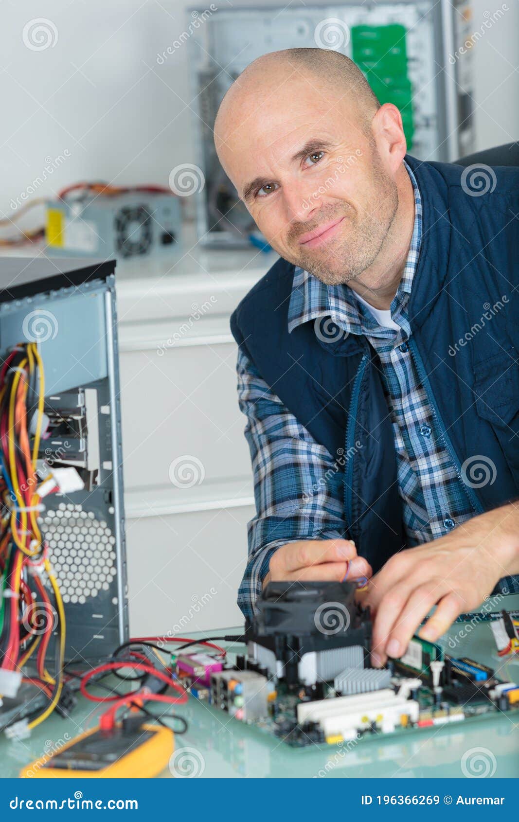 Electronic parts assembler stock image. Image of industrial - 196366269