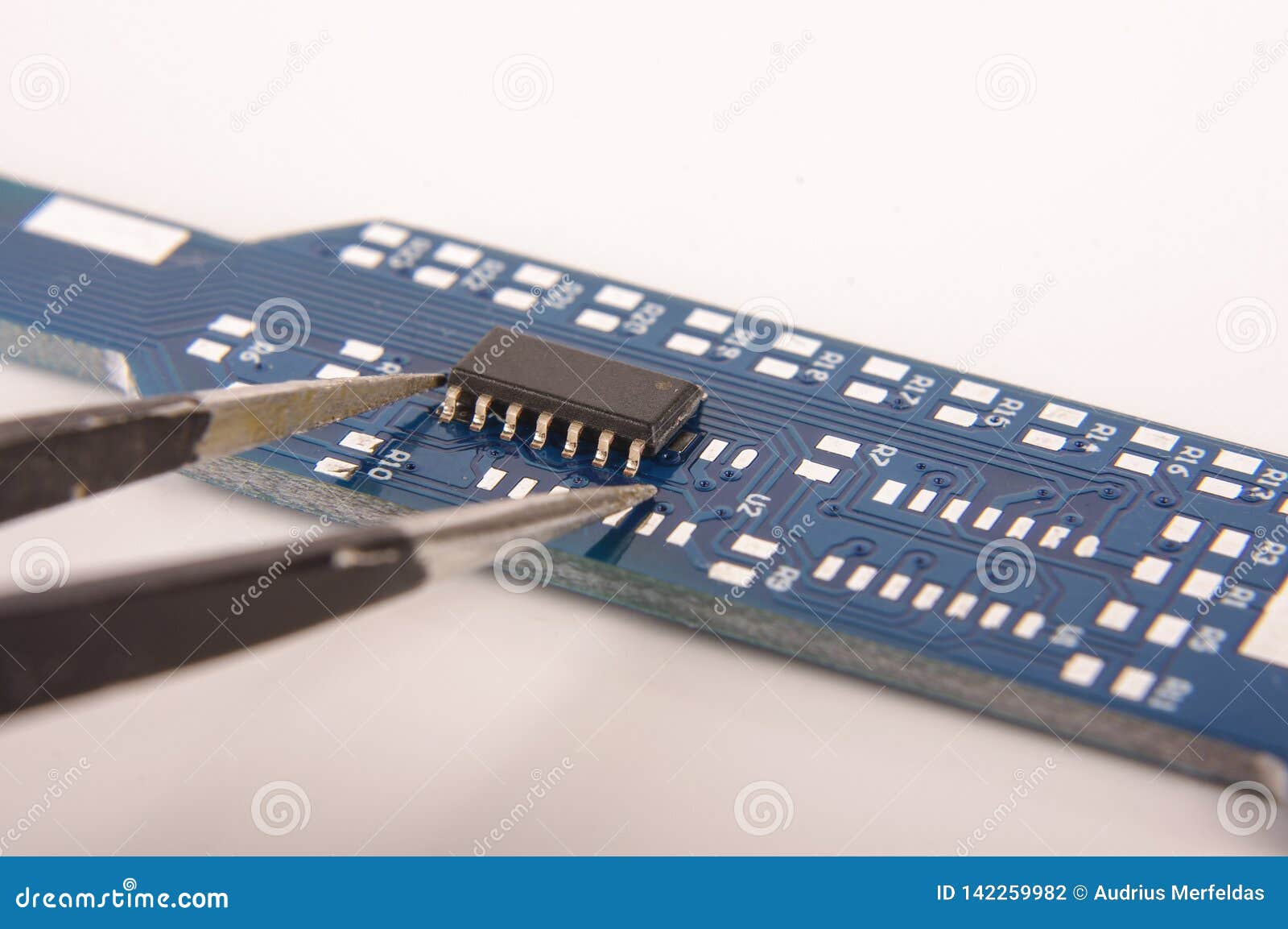 Tiny Integrated Circuit on Empty PCB Board Stock Photo - Image of ...