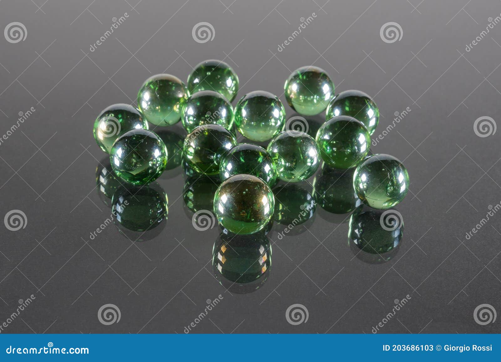 Small Emerald Green Glass Balls with Reflection and Black Background ...