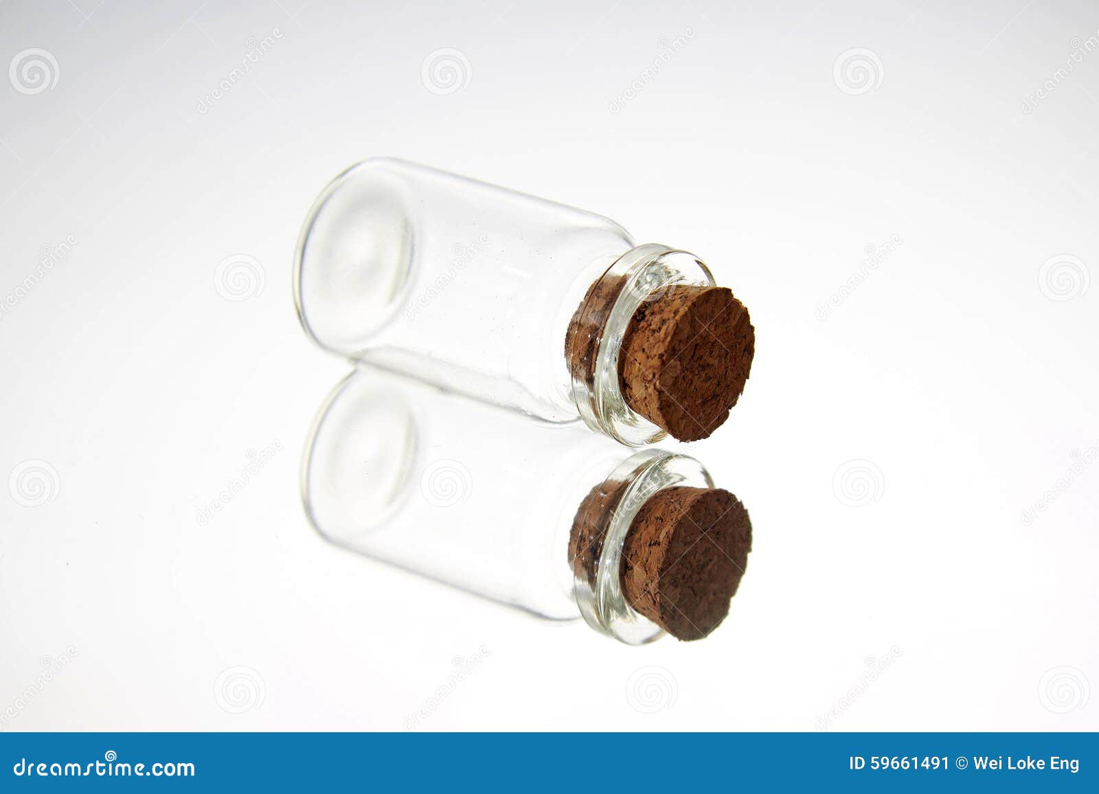 Small empty glass bottle stock image. Image of beach - 59661491