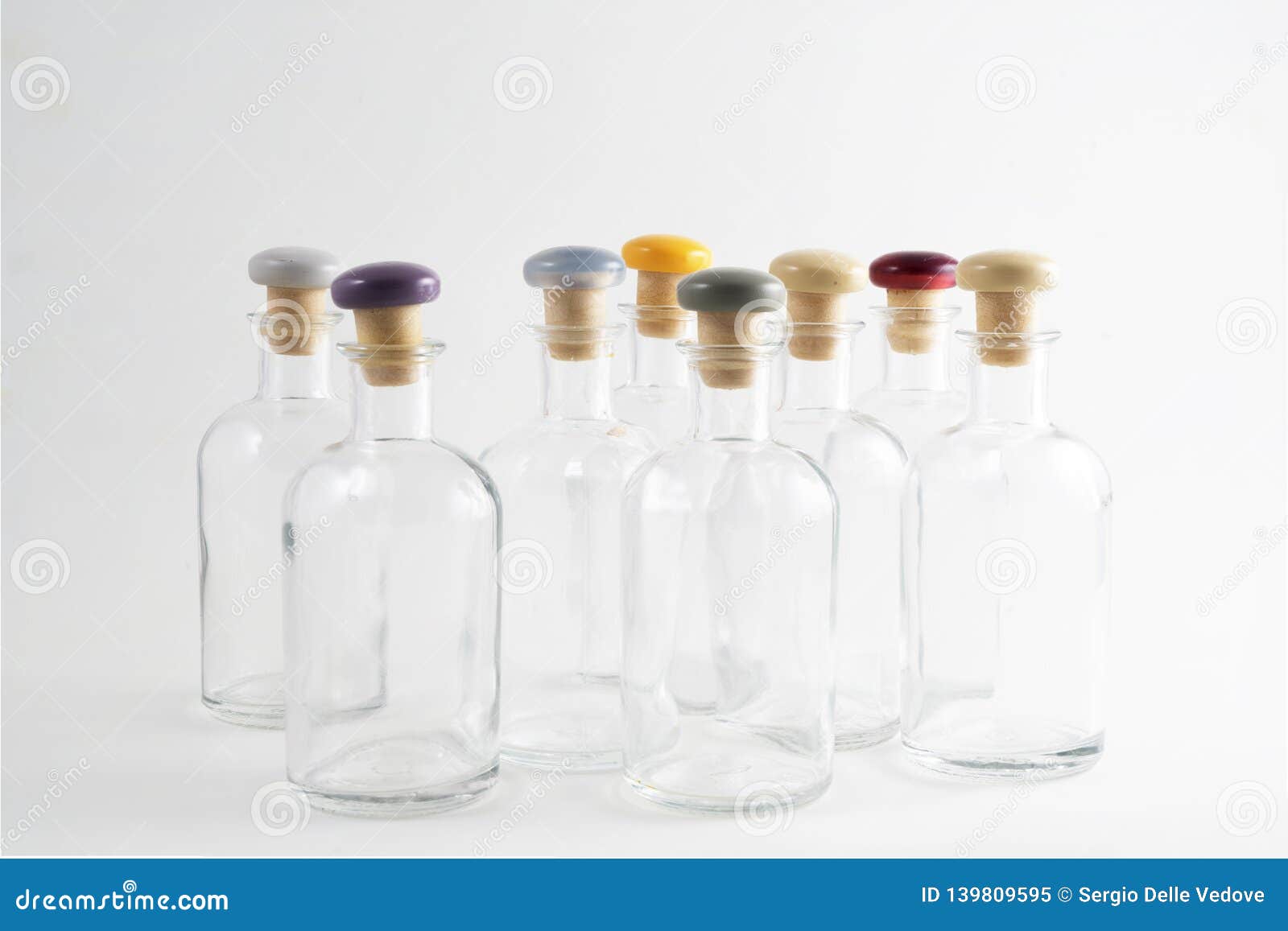Small Glass Bottles with Colored Cap Stock Image - Image of jars, glass ...
