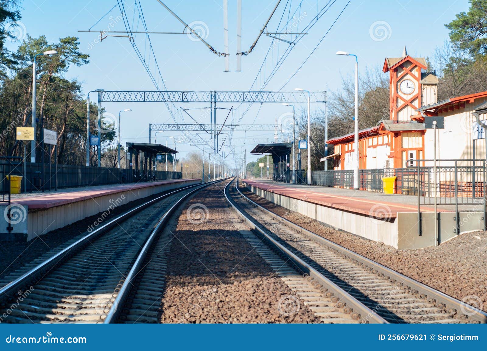 A Small Empty Railway Station, Iron Track Going into the Distance ...