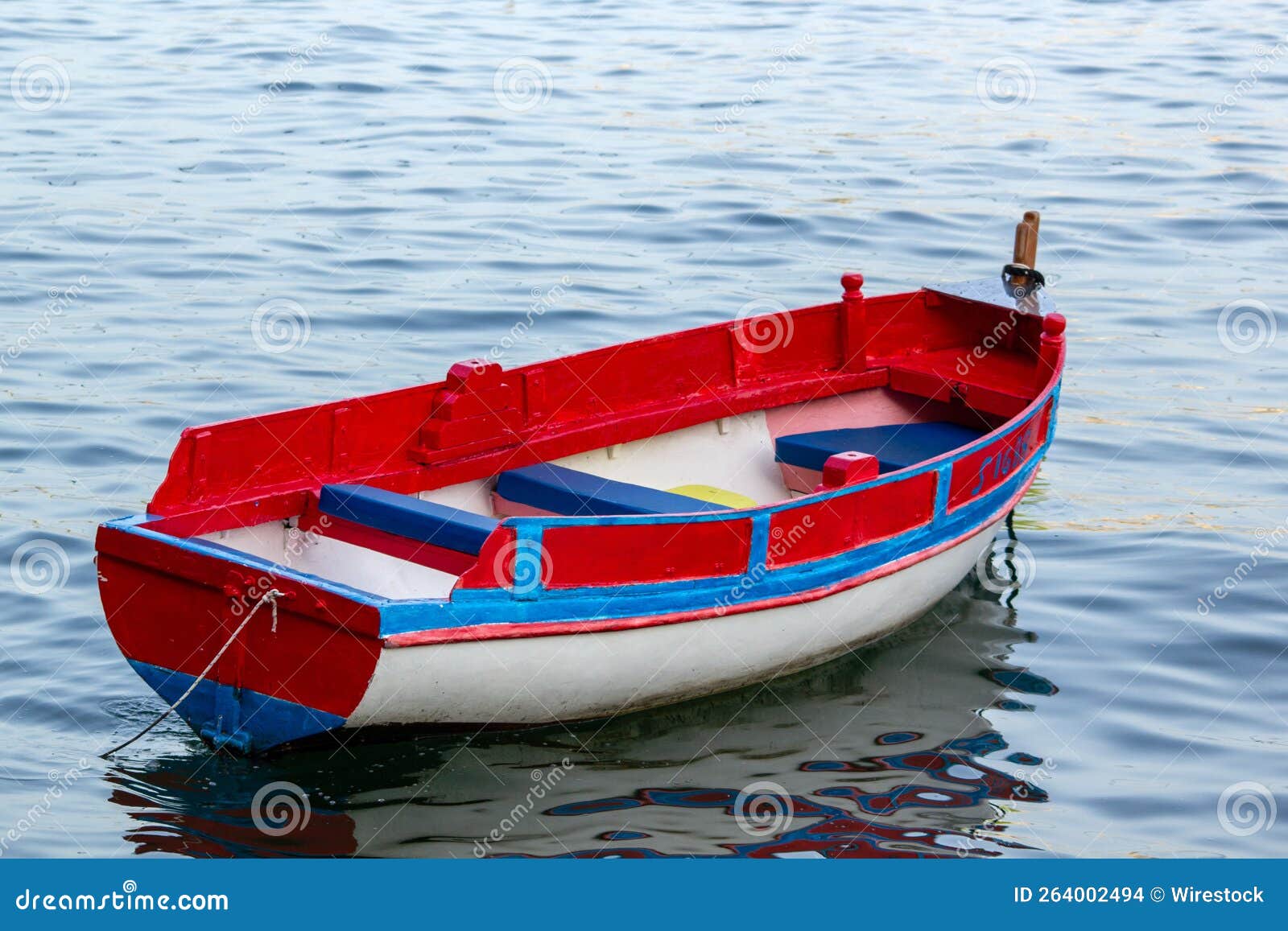 Small Empty Red Boat on the Wavy Water Stock Photo - Image of empty ...