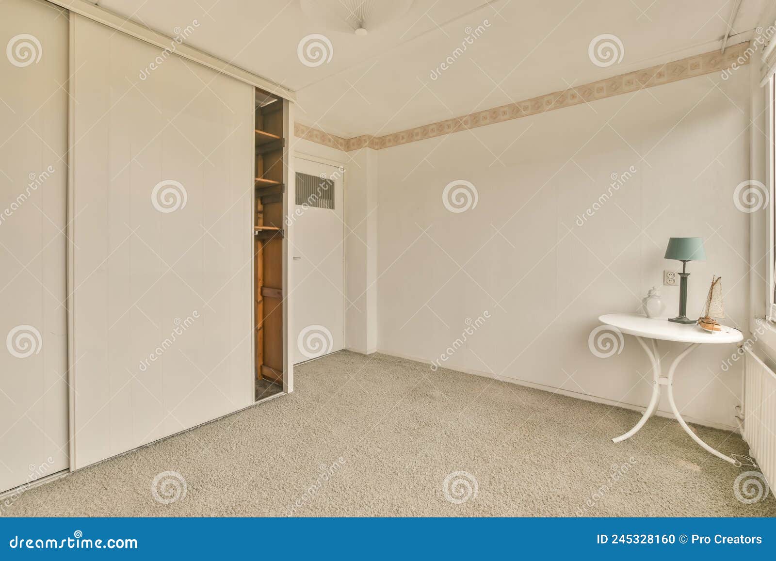 A Small Empty Room with a Large Wardrobe Stock Photo - Image of ...