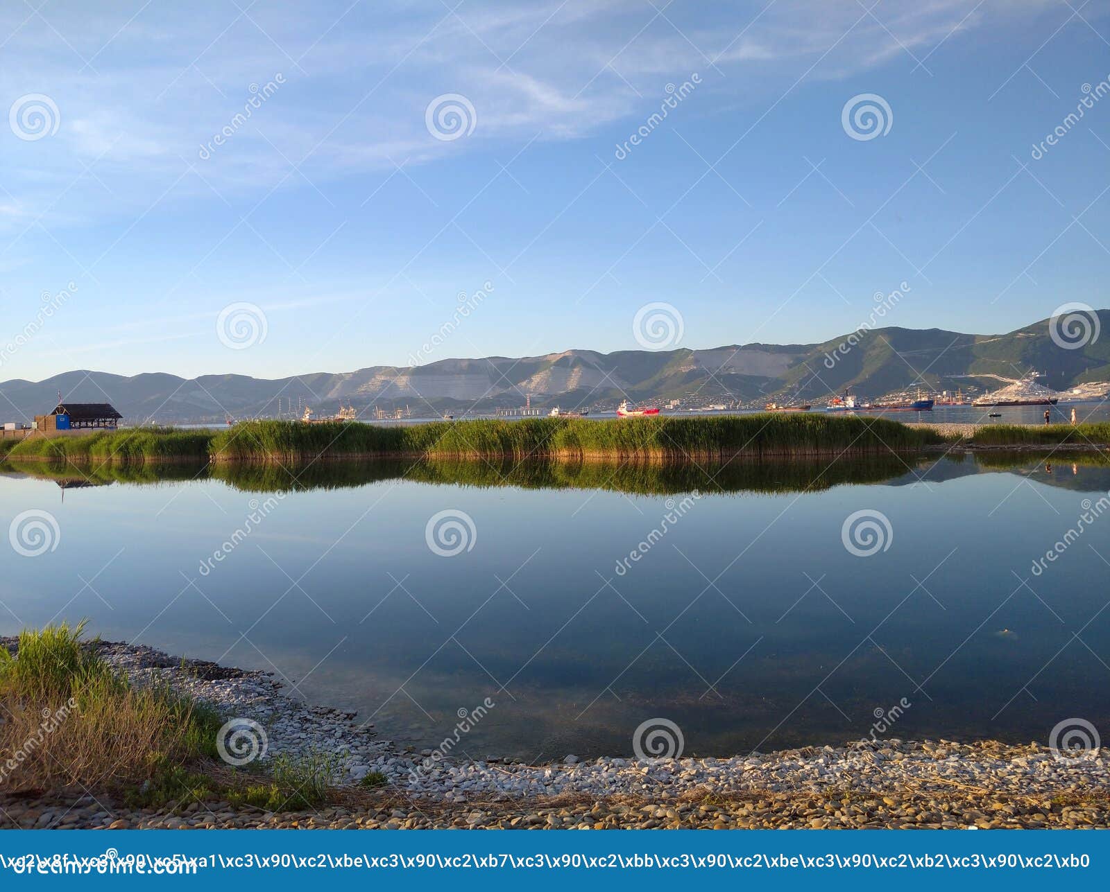 Small Estuary Against the Background of Mountains and Sky Stock Image ...