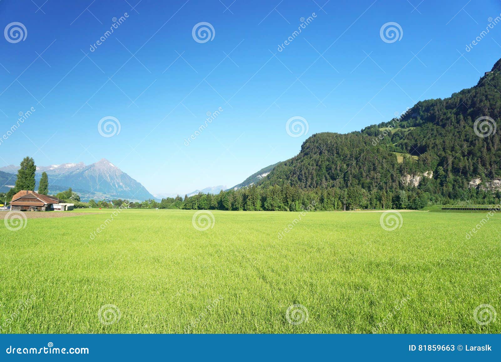 Small farm in swiss alps stock image. Image of mountain - 81859663