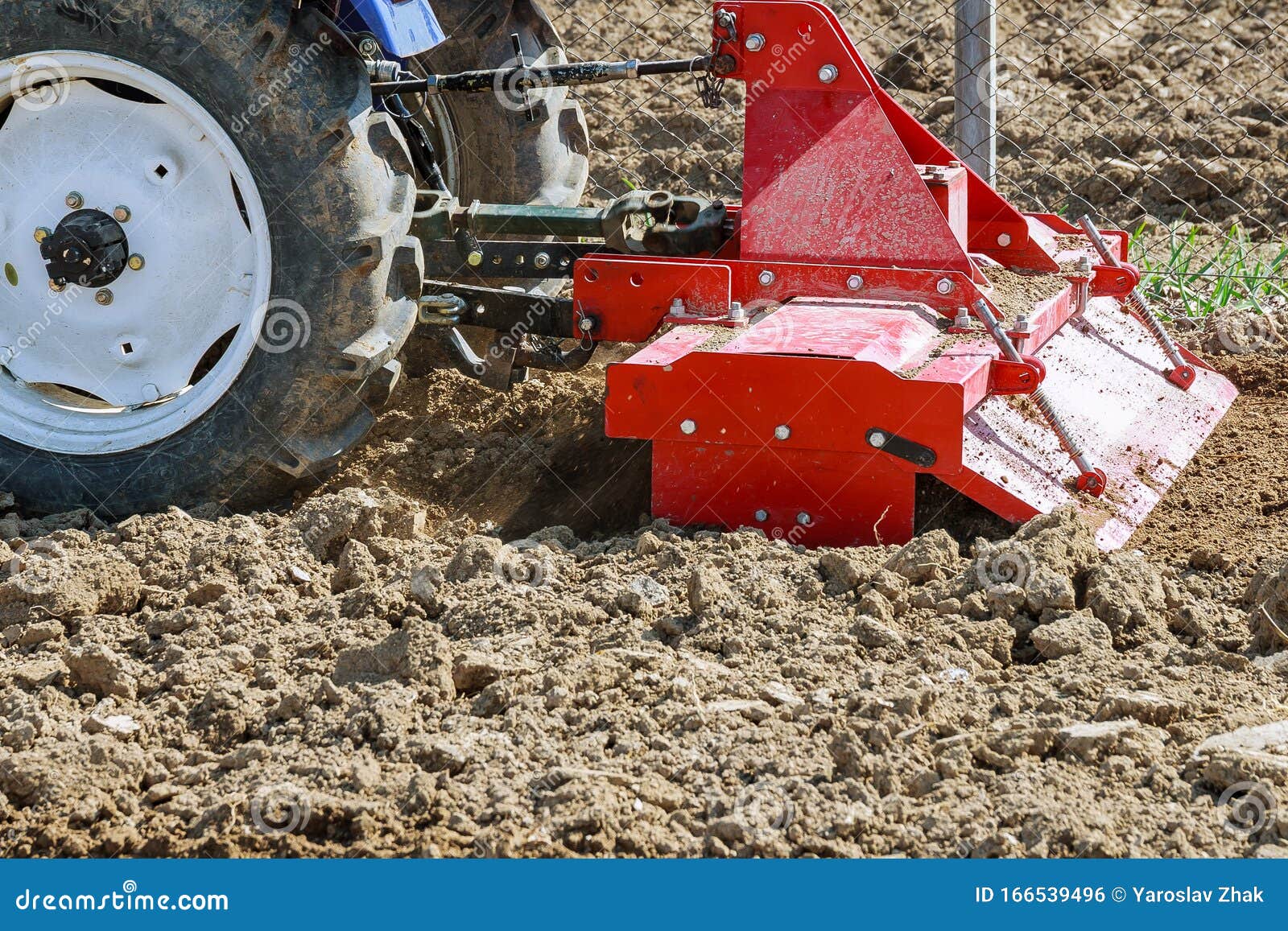 Small Farm with Tractor and Plow in the Field Stock Photo - Image of ...