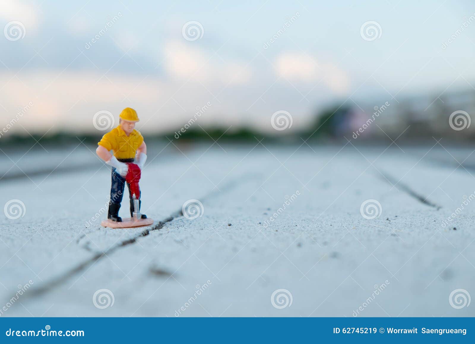 Small Figure of a Man Digging Street Stock Image - Image of person ...