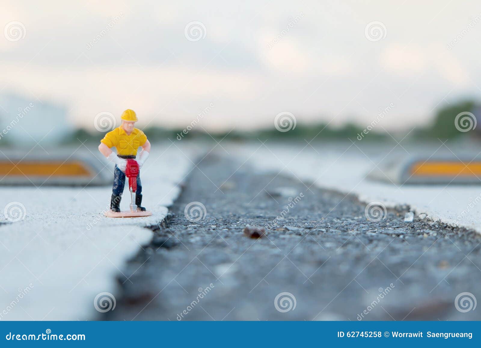 Small Figure of a Man Digging Street Stock Photo - Image of path, sign ...