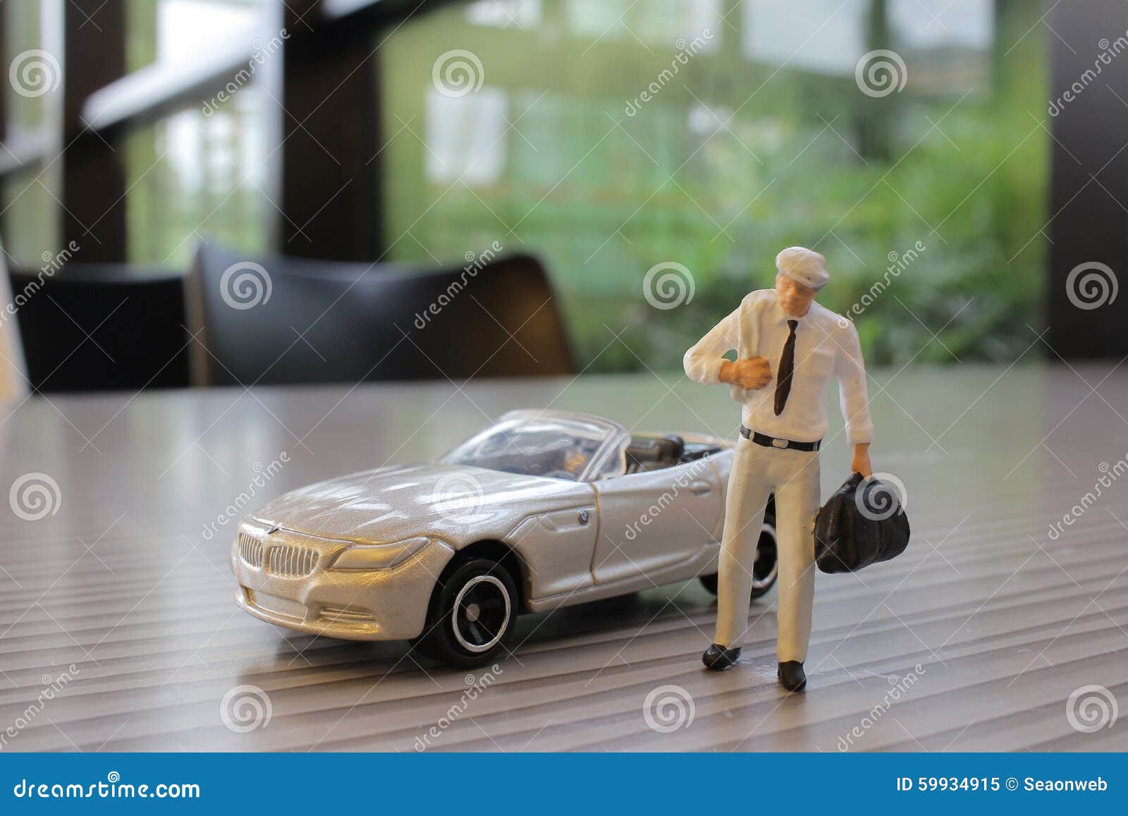 Small Figure with the Toy Sport Car Stock Image - Image of driver ...