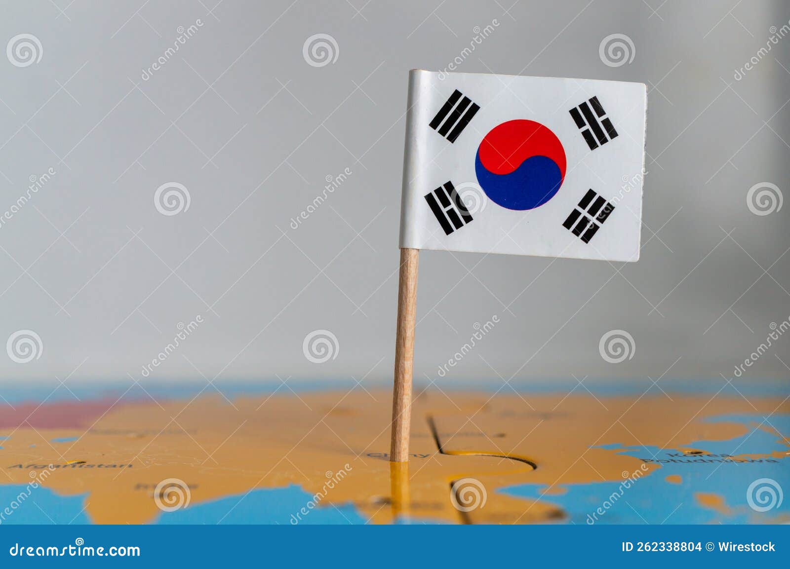 Small Flag of Korea on a Wooden Stick Fixed on the Globe Stock Photo ...