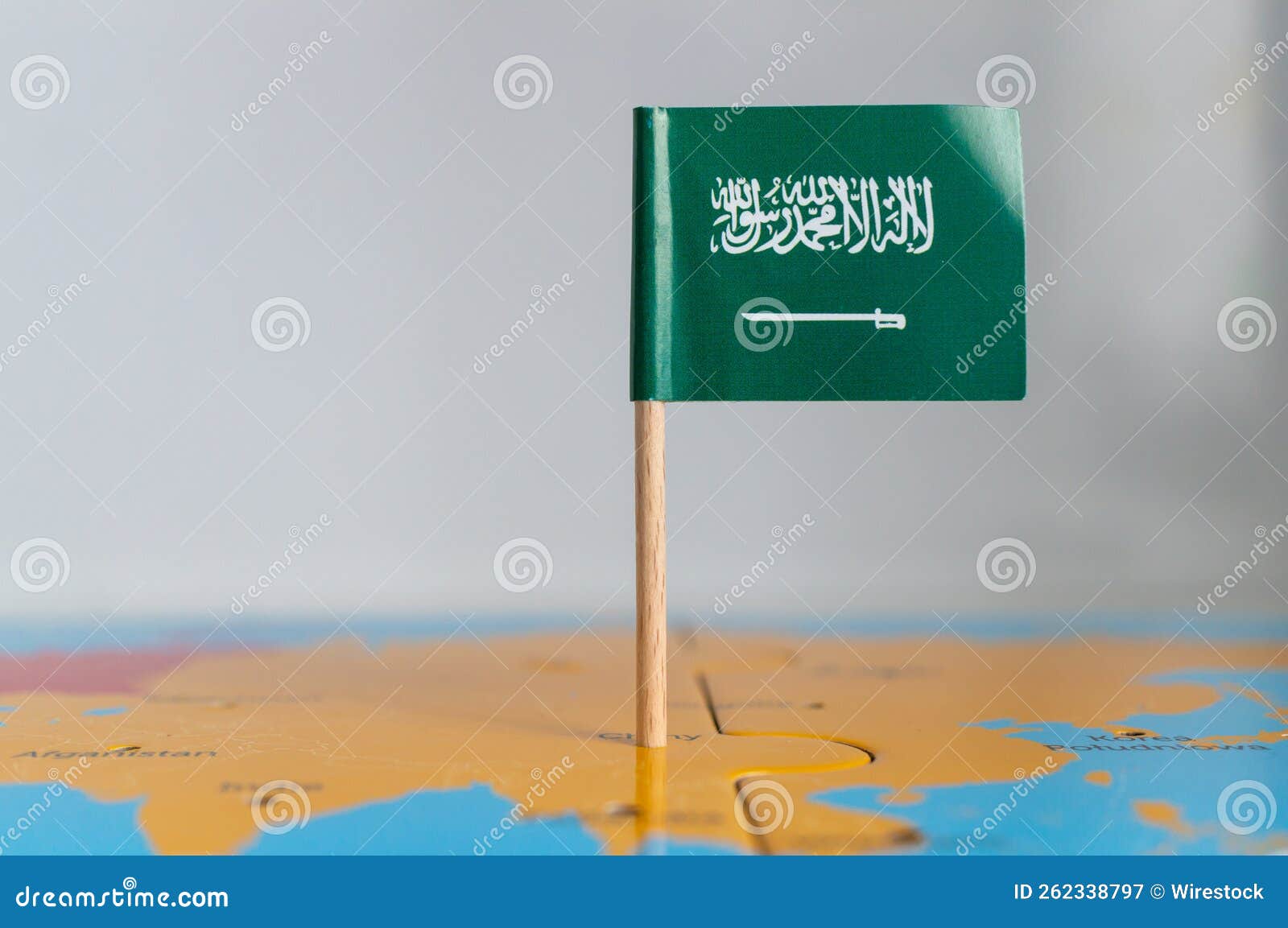 Small Flag of Saudi Arabia on a Wooden Stick Fixed on the Globe Stock ...