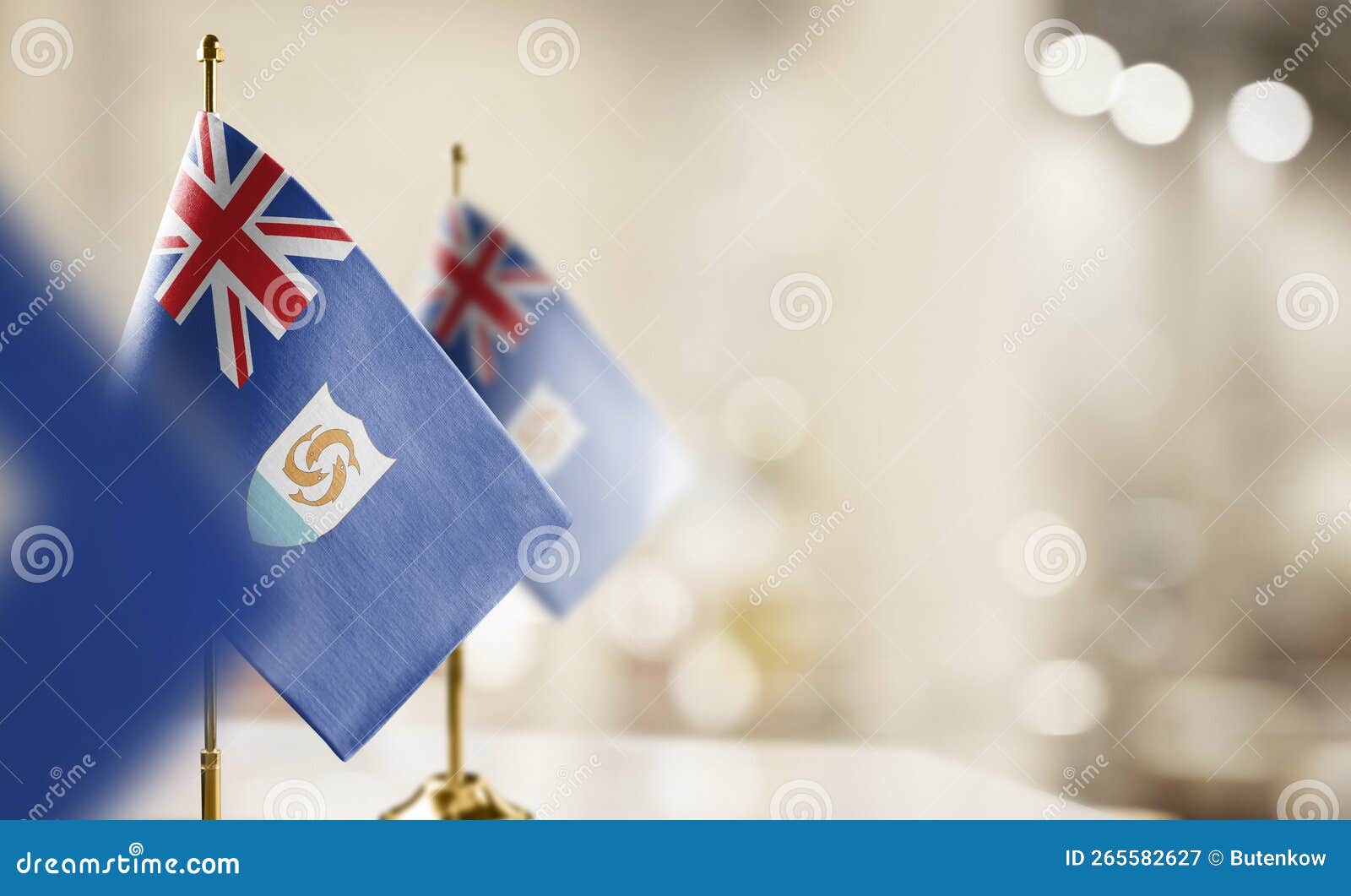 Small Flags of the Anguilla on an Abstract Blurry Background Stock ...