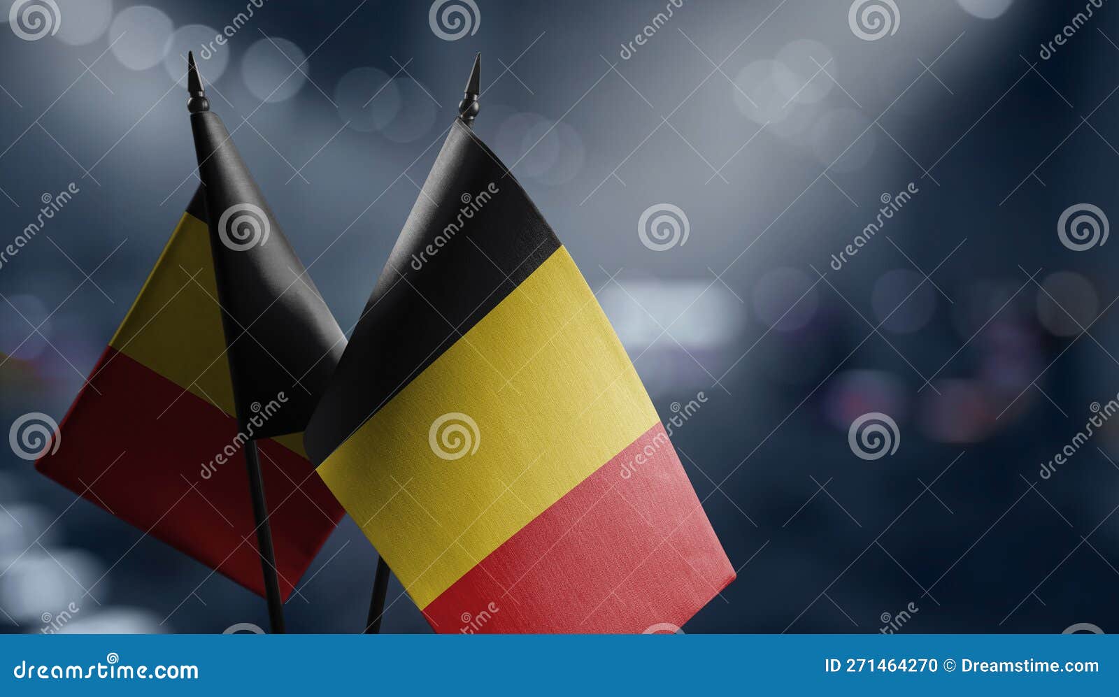 Small Flags of the Belgium on an Abstract Blurry Background Stock Photo ...