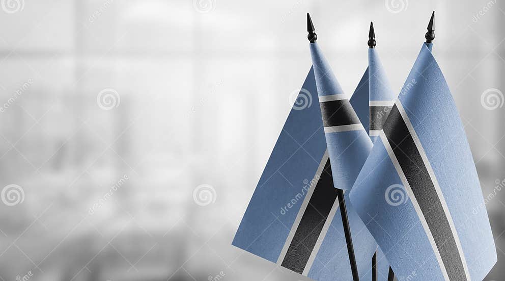 Small Flags of the Botswana on an Abstract Blurry Background Stock ...