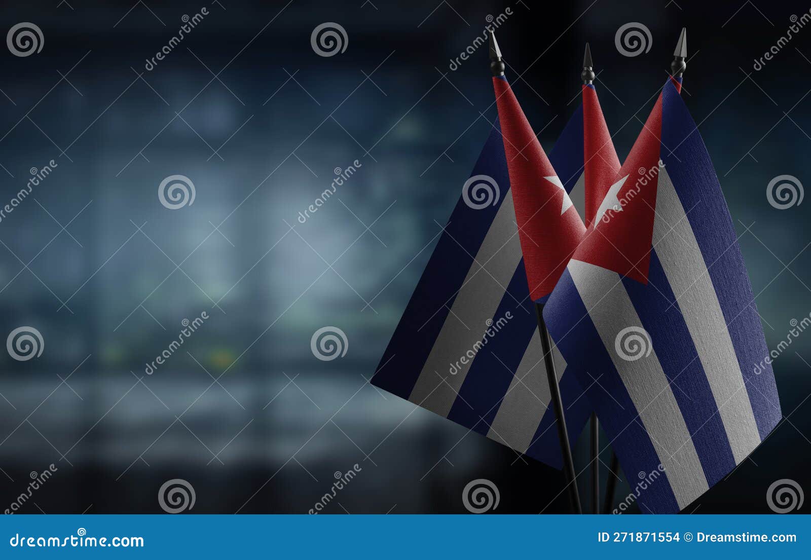 Small Flags of the Cuba on an Abstract Blurry Background Stock Photo ...