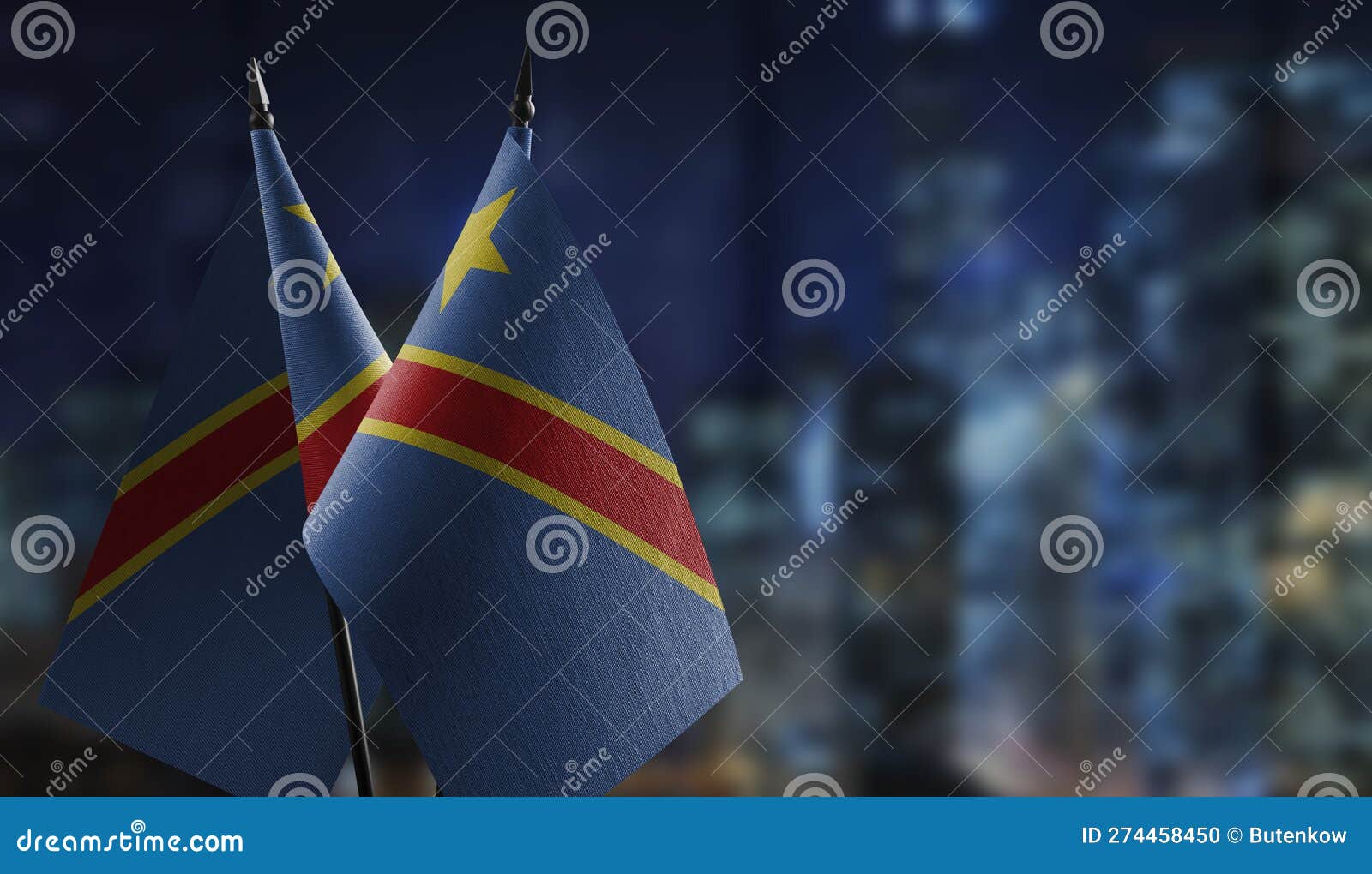Small Flags of the Democratic Republic of the Congo on an Abstract ...