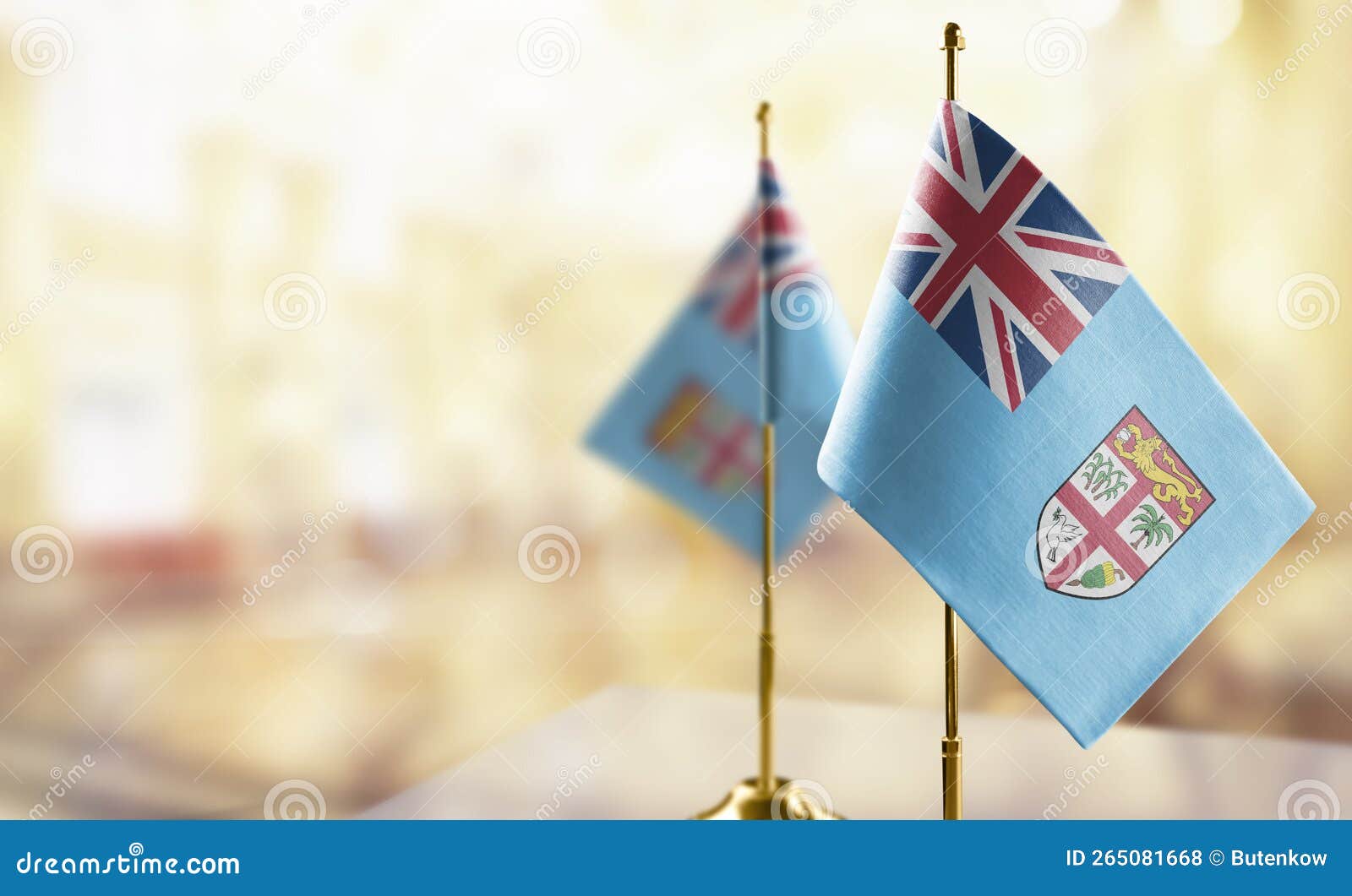 Small Flags of the Fiji on an Abstract Blurry Background Stock ...