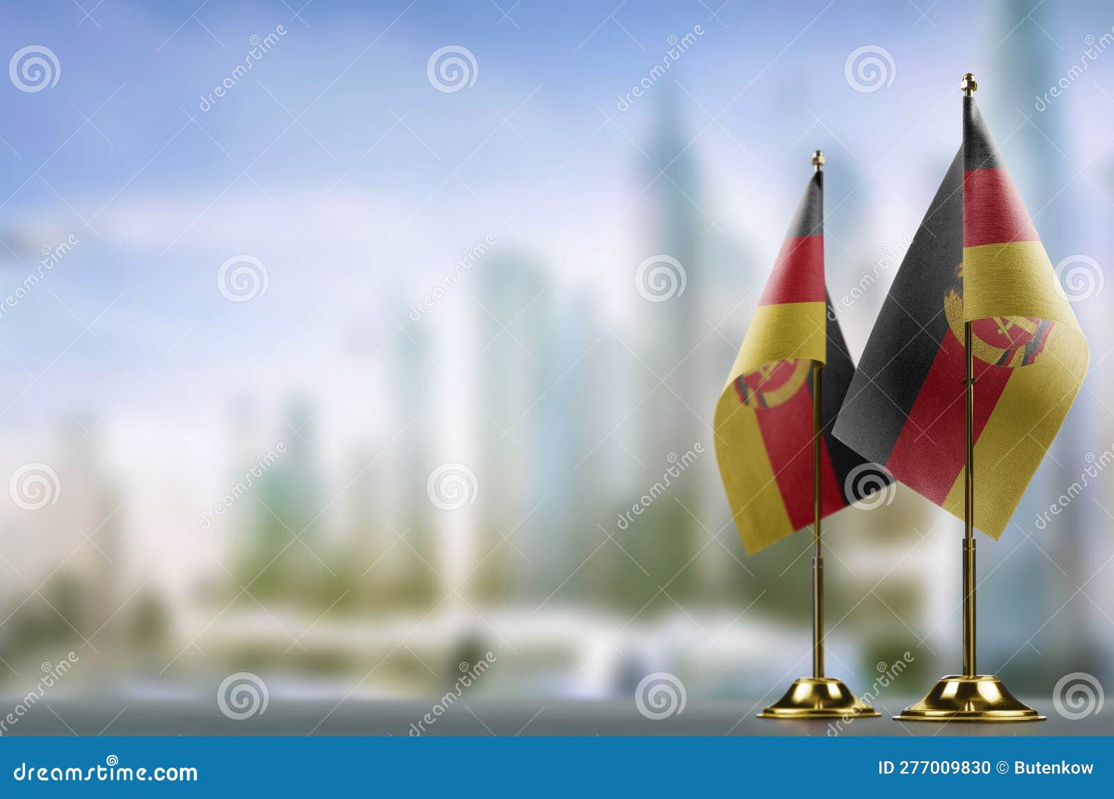 Small Flags of the GDR on an Abstract Blurry Background Stock Photo ...