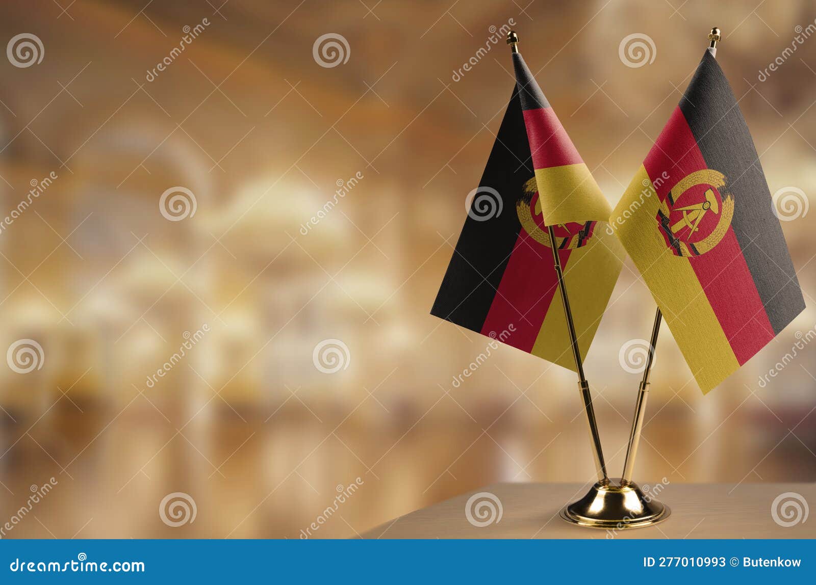 Small Flags of the GDR on an Abstract Blurry Background Stock Image ...