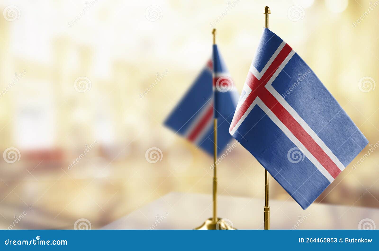 Small Flags of the Iceland on an Abstract Blurry Background Stock Image ...