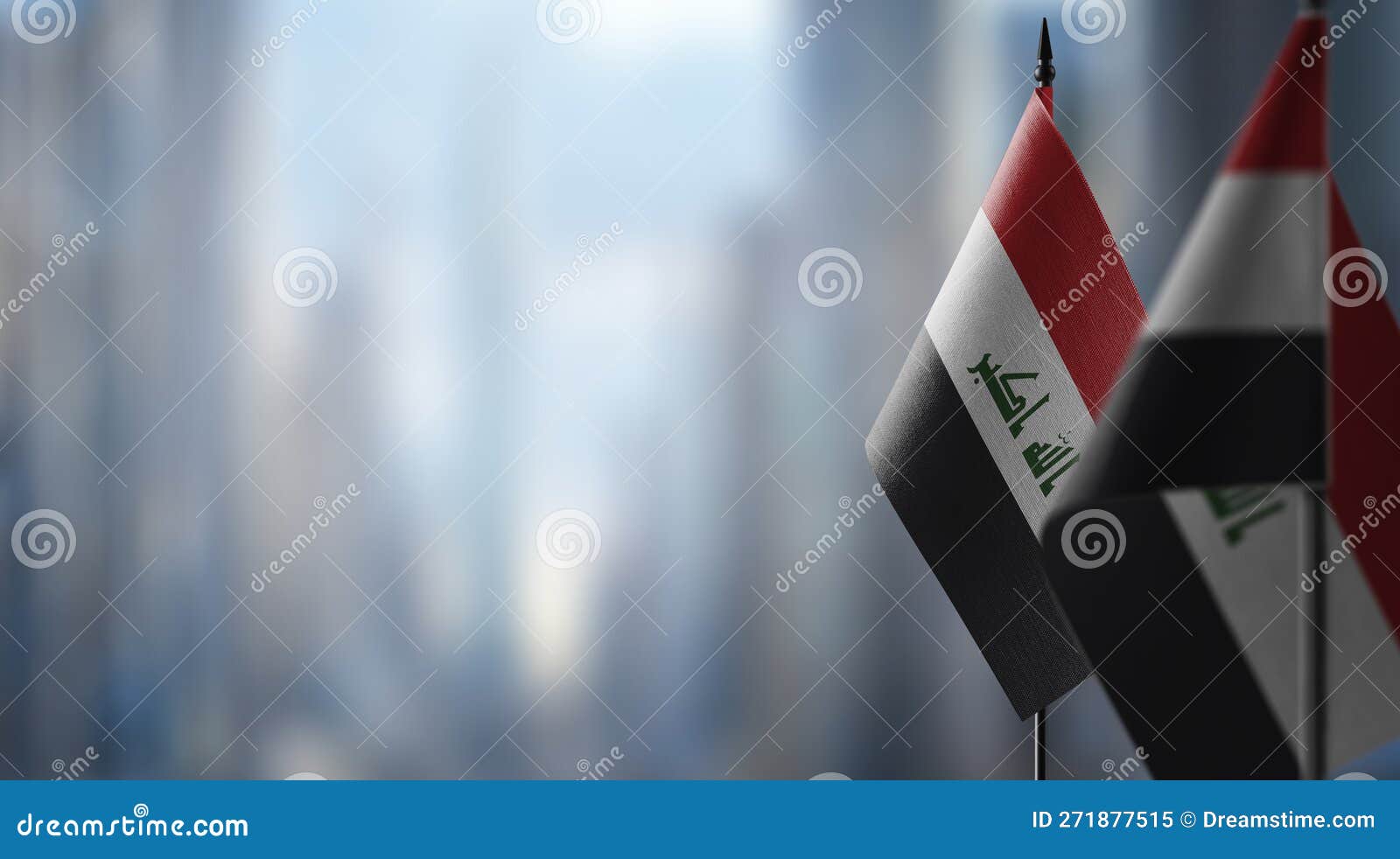 Small Flags of the Iraq on an Abstract Blurry Background Stock Image ...