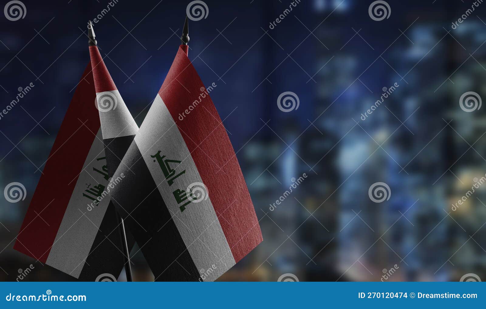 Small Flags of the Iraq on an Abstract Blurry Background Stock Photo ...