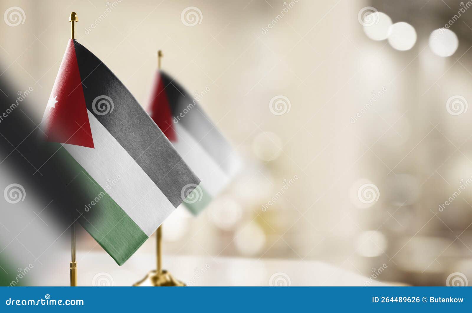 Small Flags of the Jordan on an Abstract Blurry Background Stock Photo ...