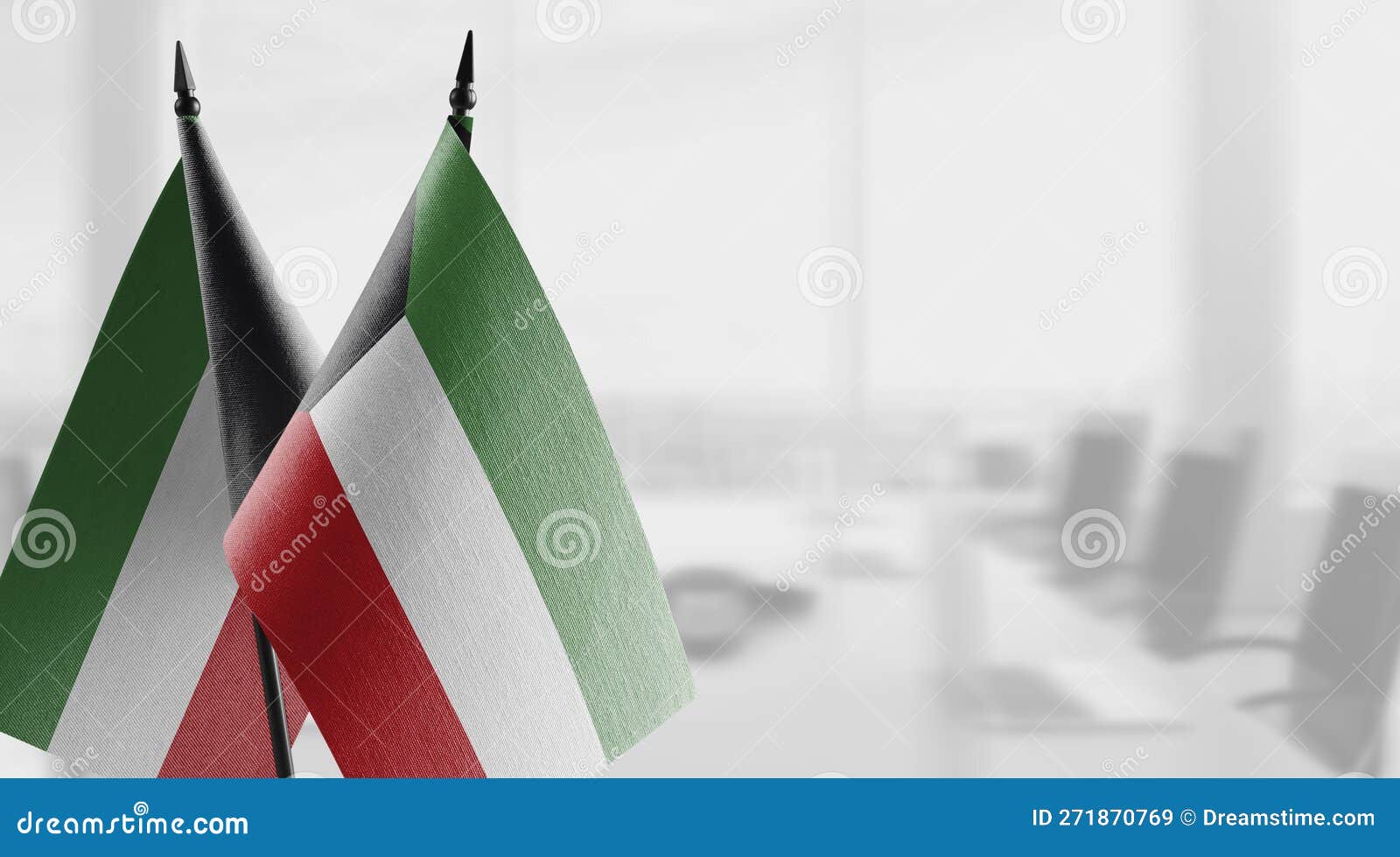 Small Flags of the Kuwait on an Abstract Blurry Background Stock Image ...