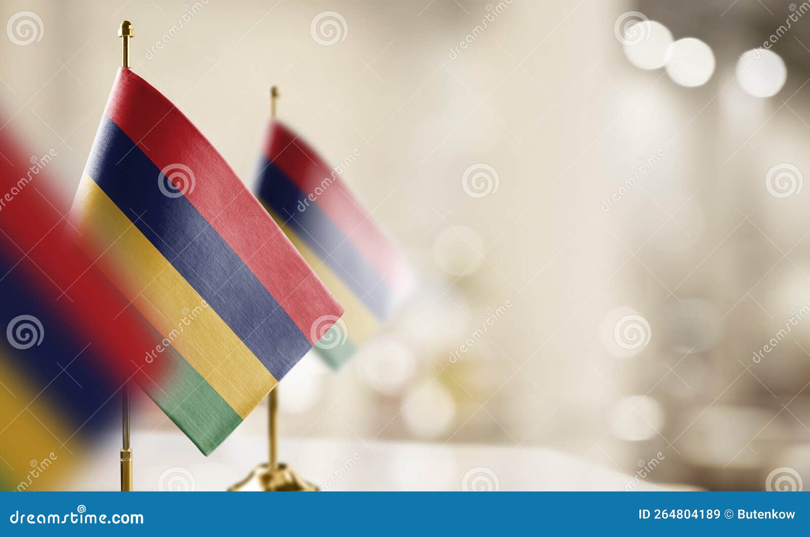 Small Flags of the Mauritius on an Abstract Blurry Background Stock ...