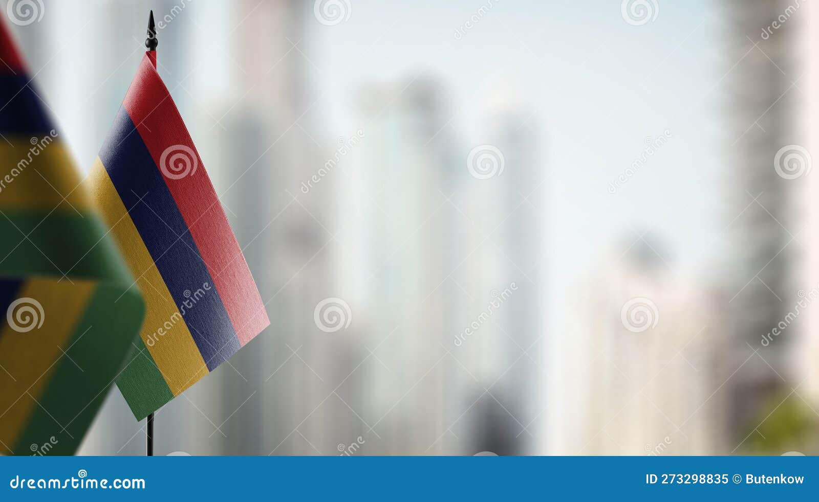 Small Flags of the Mauritius on an Abstract Blurry Background Stock ...