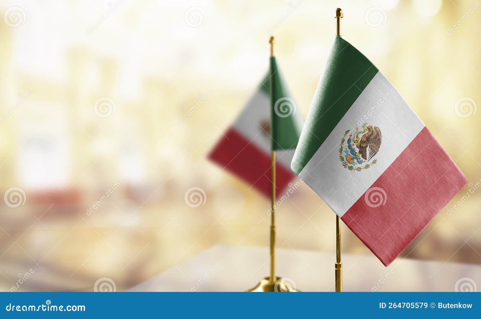 Small Flags of the Mexico on an Abstract Blurry Background Stock Image ...