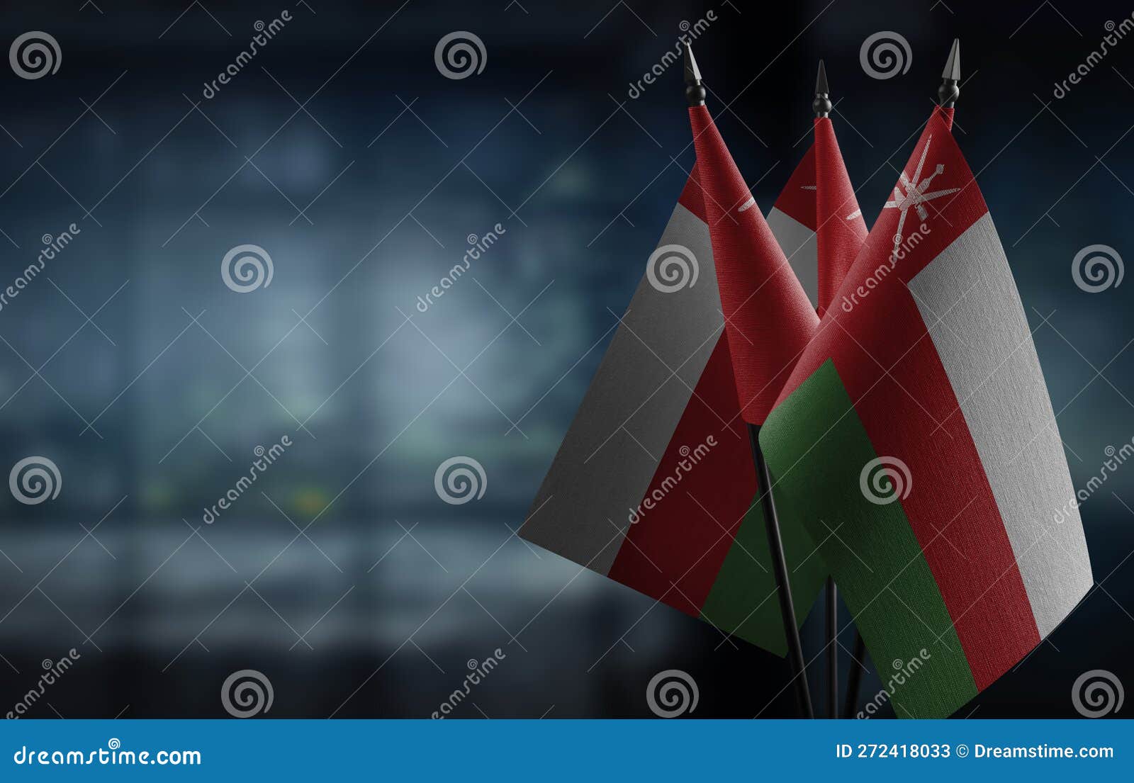 Small Flags of the Oman on an Abstract Blurry Background Stock Image ...