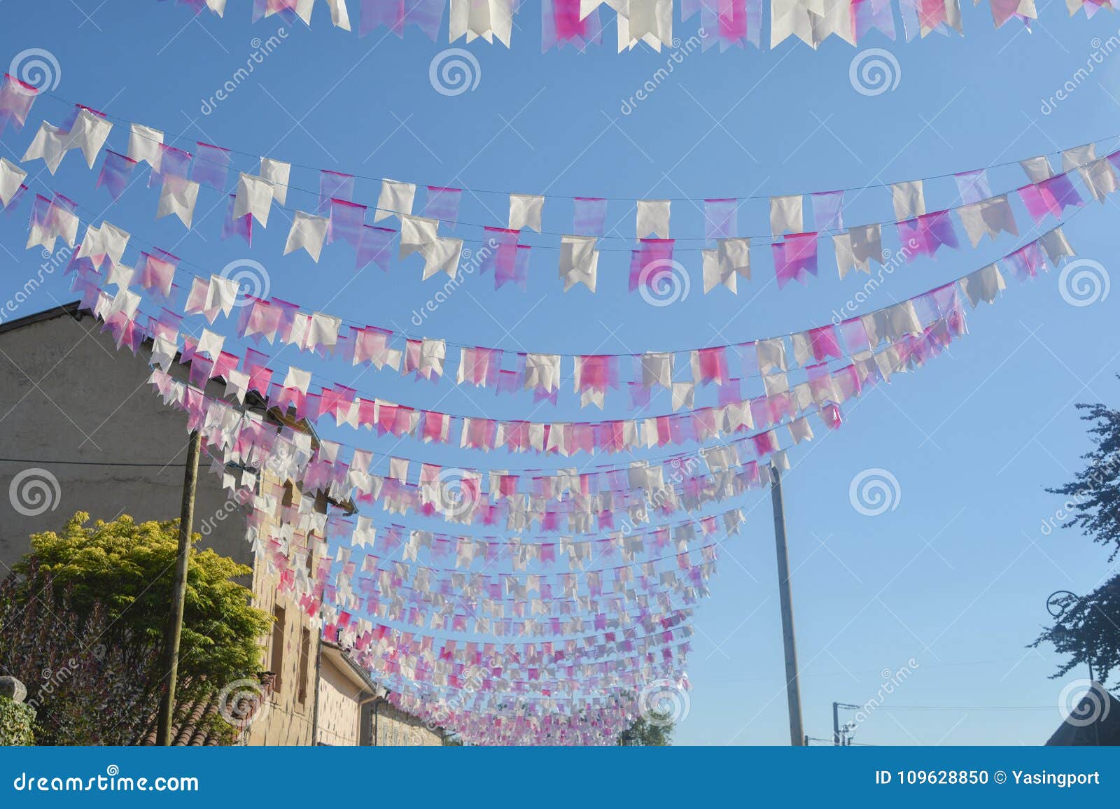 Small Flags Stretched on a Rope Stock Photo - Image of boundary, bright ...