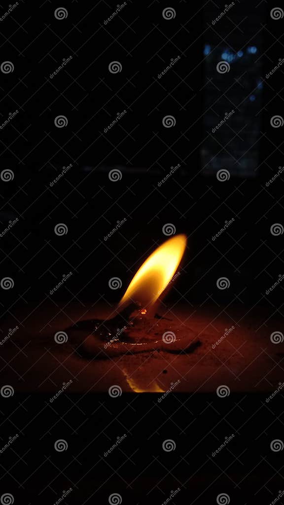 A Small Flame Lit Up the Darkness in the Room Stock Image - Image of ...