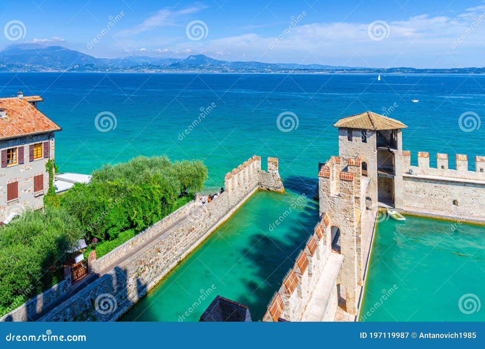 Small Fortified Harbor with Turquoise Water, Scaligero Castle Castello ... Small Fortified Harbor with Turquoise Water, Scaligero Castle Castello ...