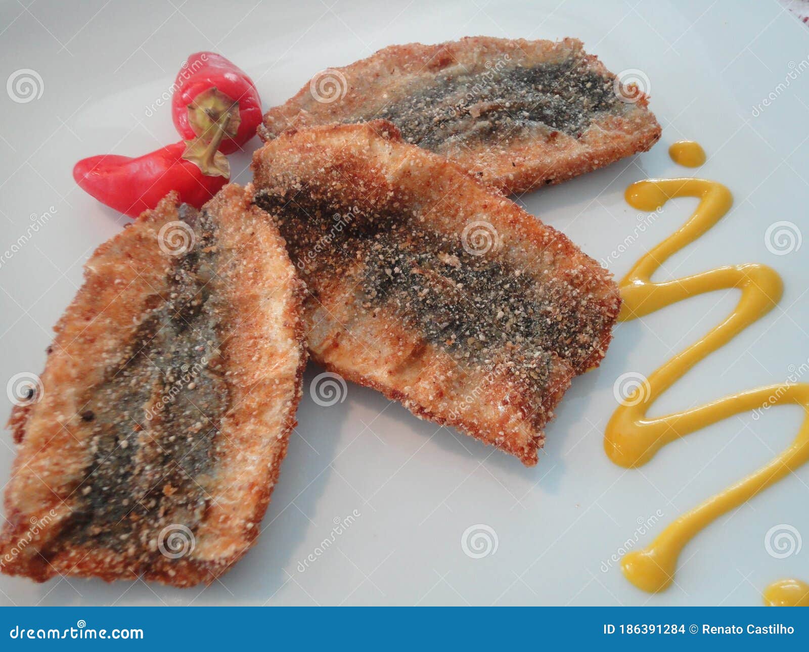 Small Fried Fish Appetizer on White Plate Stock Photo - Image of ...