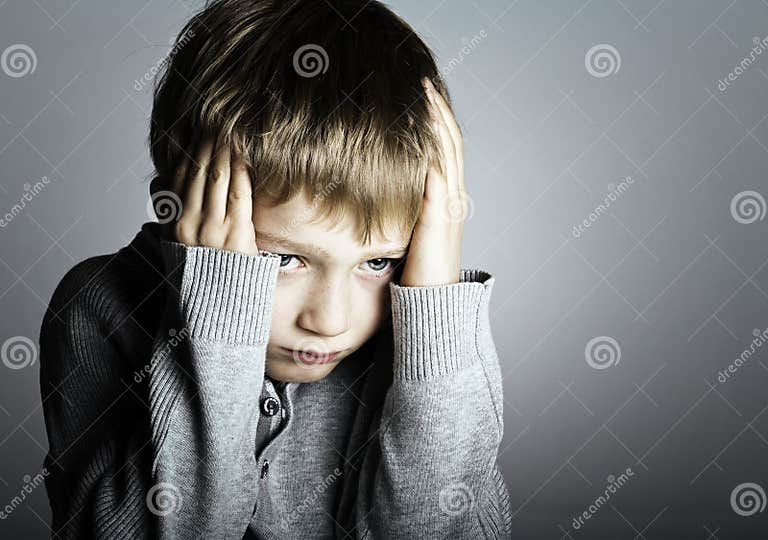 Small frightened boy stock image. Image of child, cower - 12649817