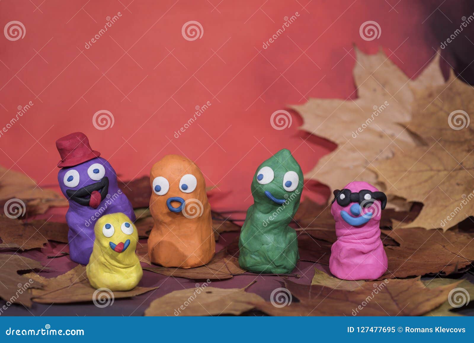 Small Funny Figures Made from Play Clay. Autumn Abstraction Stock Image ...