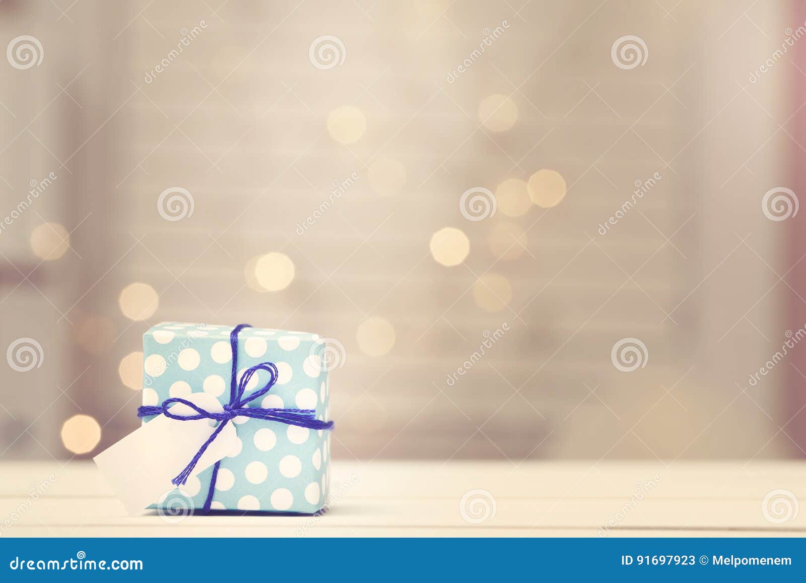 Small Gift Box on Abstract Light Stock Image - Image of home, blur ...