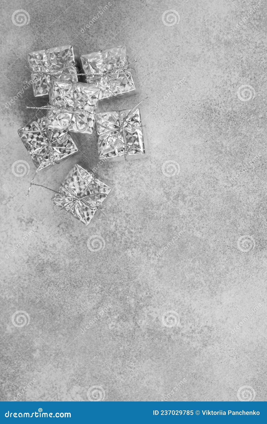 Small Gift Boxes in a Silver Wrapper Stock Image - Image of assortment ...