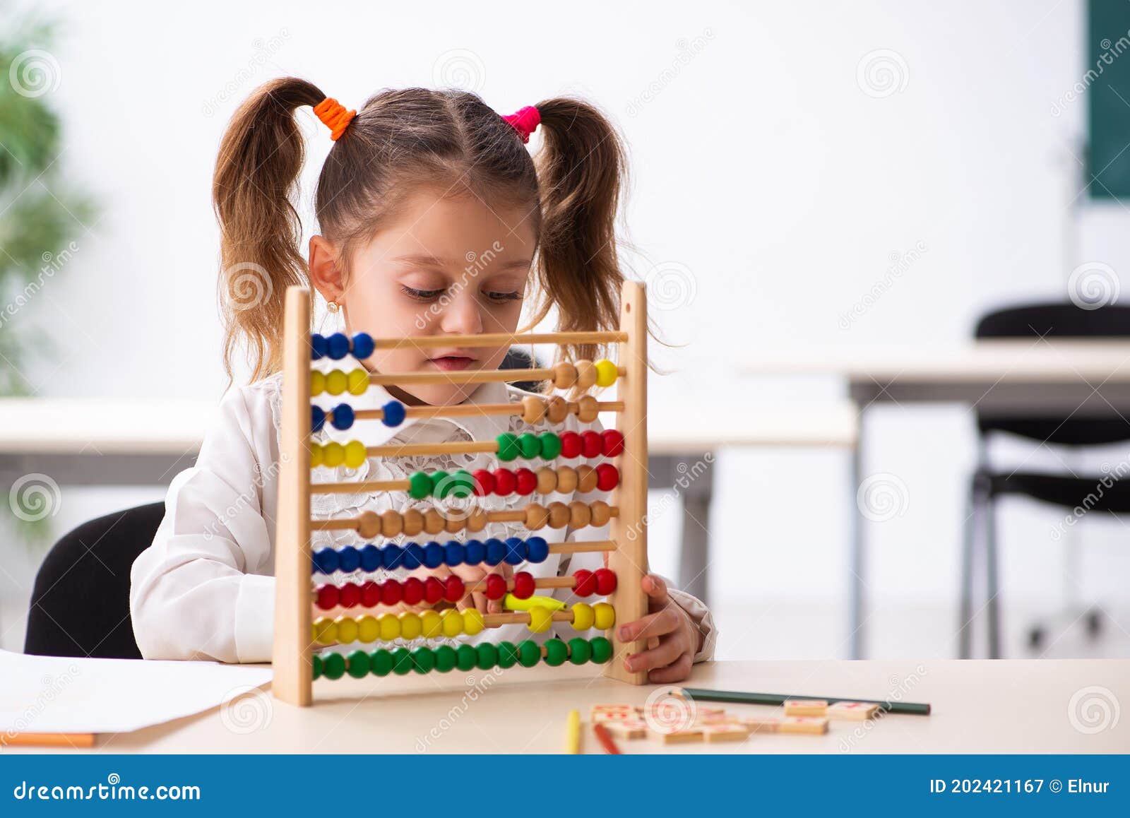 Small Girl with Abacus in the Classroom Stock Image - Image of ...