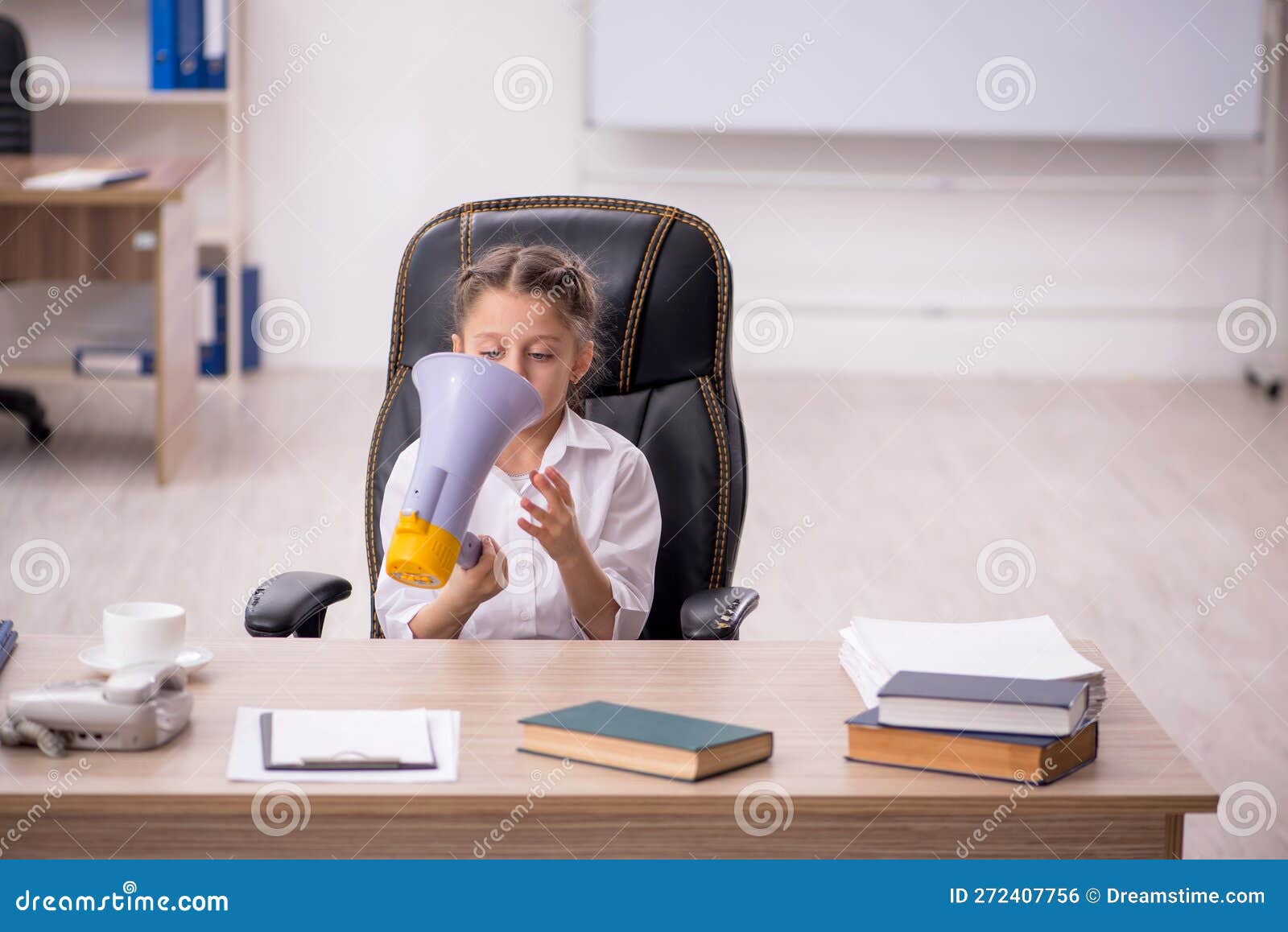Small Girl Holding Megaphone in the Classroom Stock Photo - Image of ...