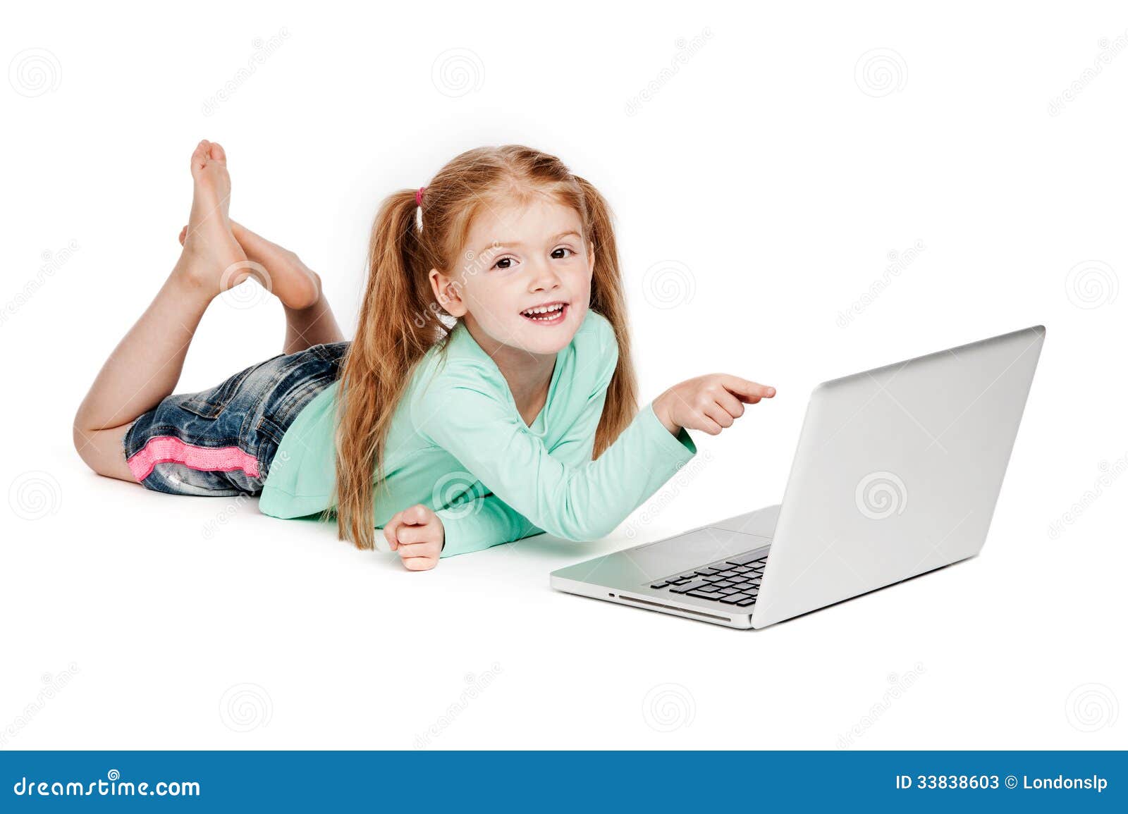 Small Girl Pointing at Laptop Computer Stock Image - Image of cheerful ...