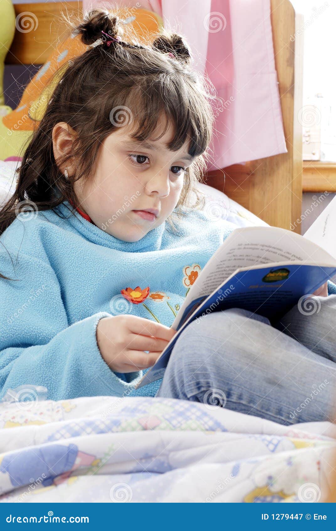 Small Girl reading stock image. Image of reading, young - 1279447