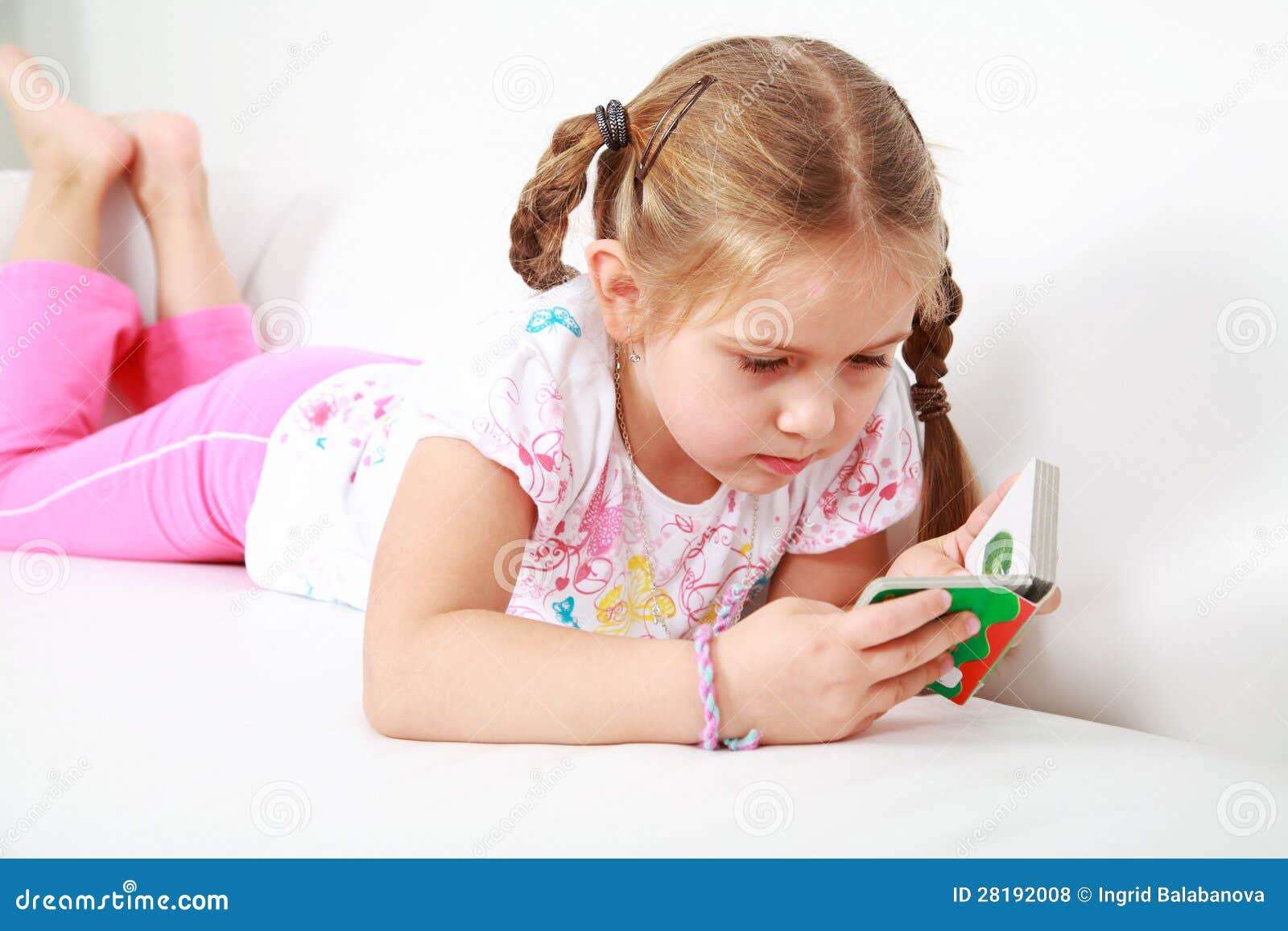 Small Girl Relaxing and Reading Stock Photo - Image of preschool ...