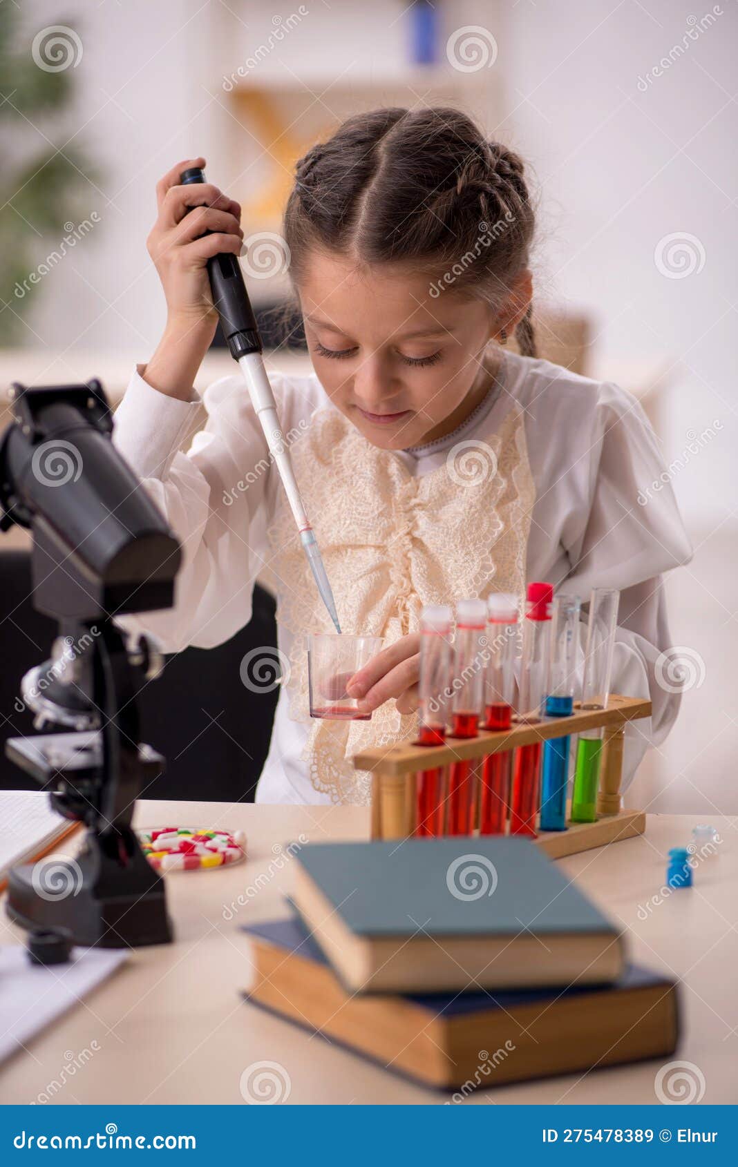 Small Girl Studying Chemistry in the Classroom Stock Image - Image of ...
