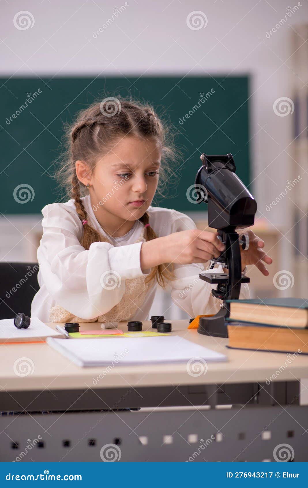 Small Girl Studying in the Classroom Stock Image - Image of study ...