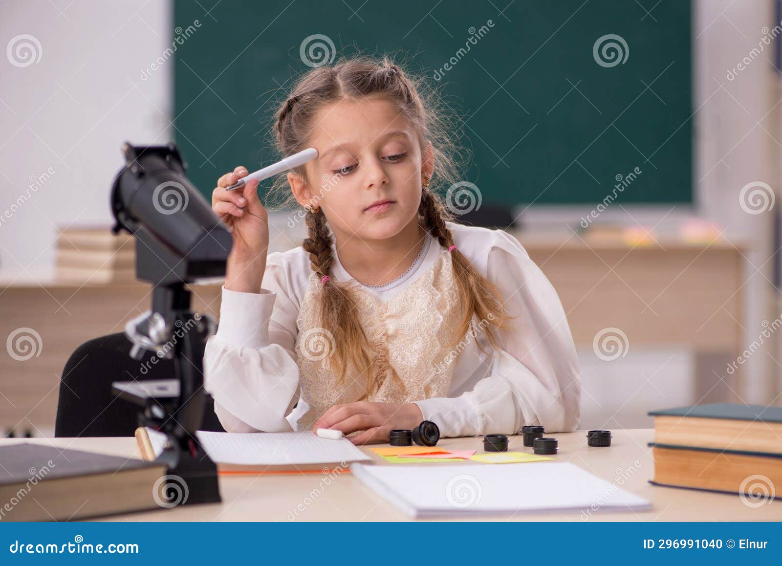 Small Girl Studying in the Classroom Stock Photo - Image of child ...